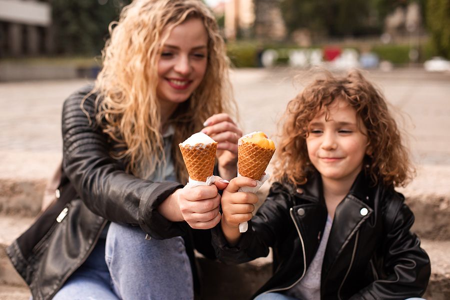Mom And Daughter Eating Ice Cream